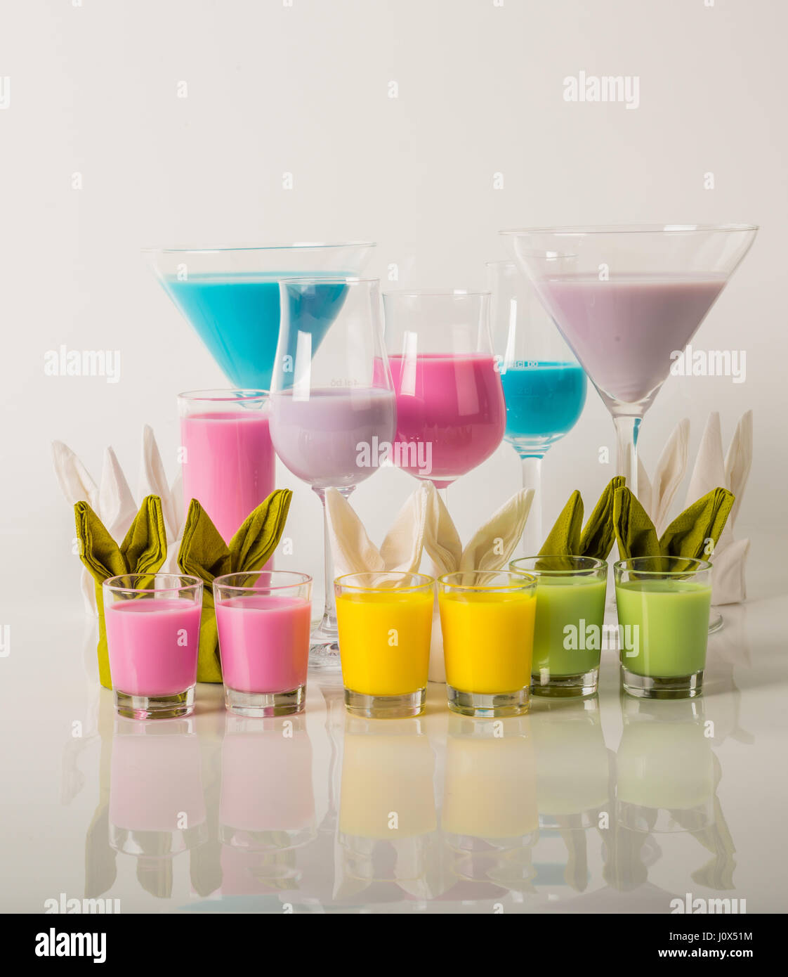 Colorful drinks based on milk liqueurs, unique pastel colors of drinks ...