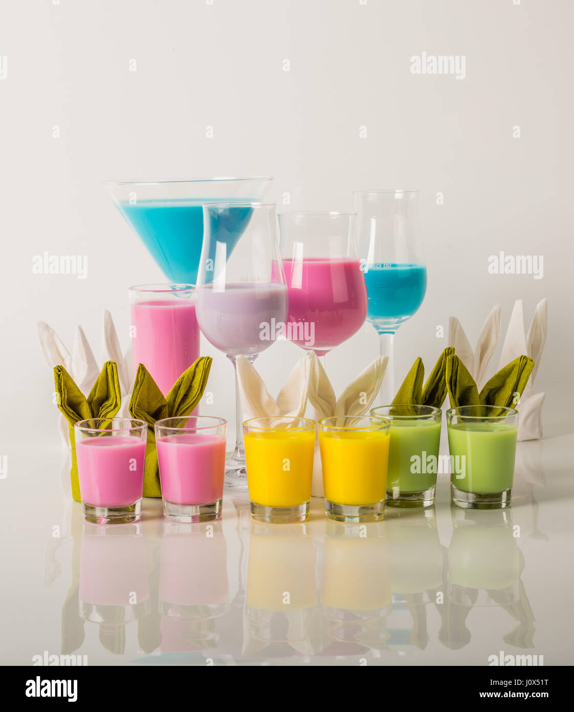 Colorful drinks based on milk liqueurs, unique pastel colors of drinks ...