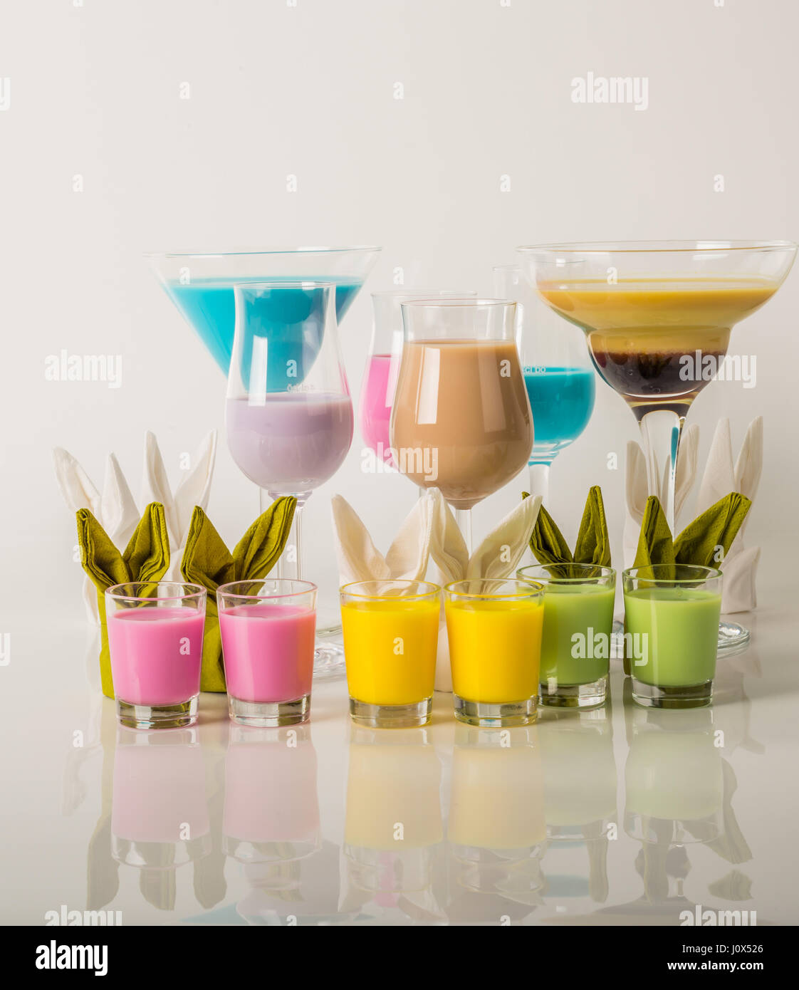 Colorful drinks based on milk liqueurs, unique pastel colors of drinks ...