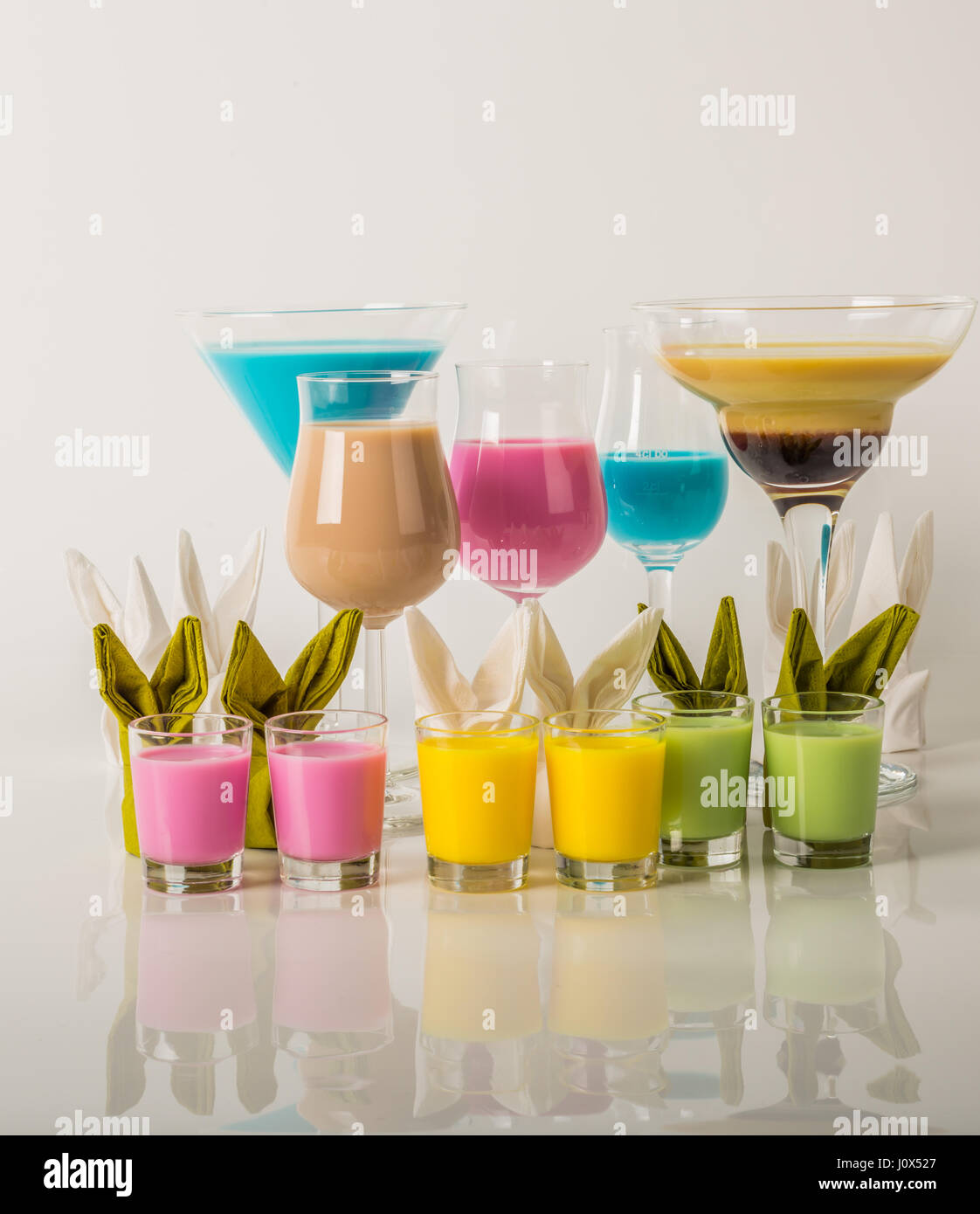 Colorful drinks based on milk liqueurs, unique pastel colors of drinks ...