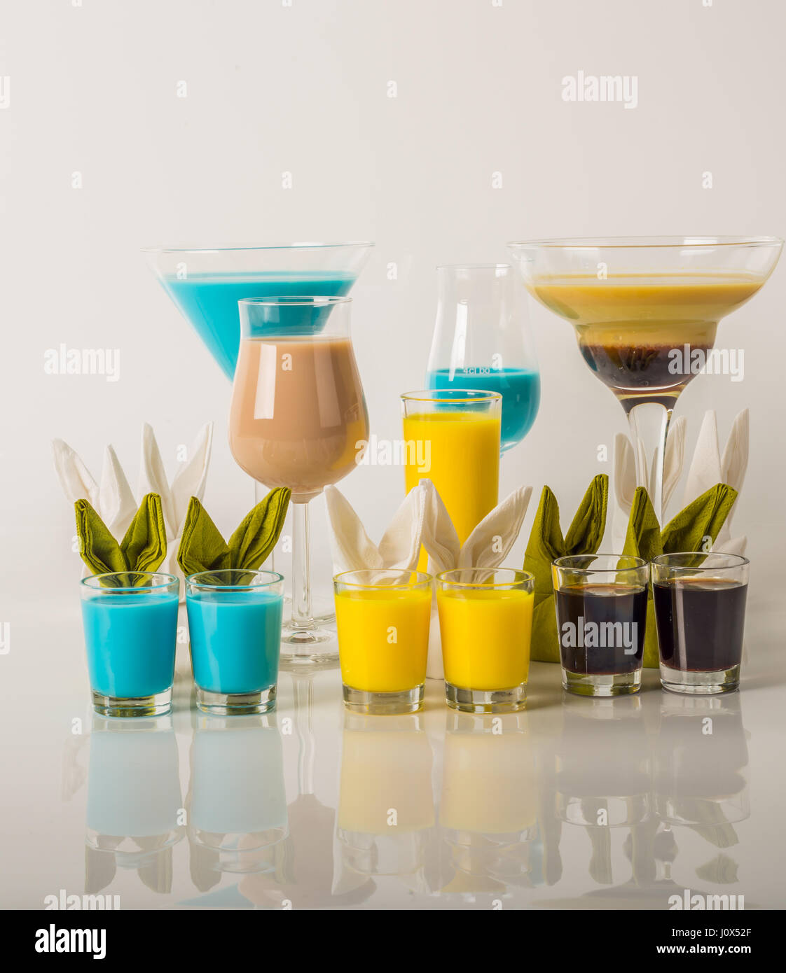 Colorful drinks based on milk liqueurs, unique pastel colors of drinks ...