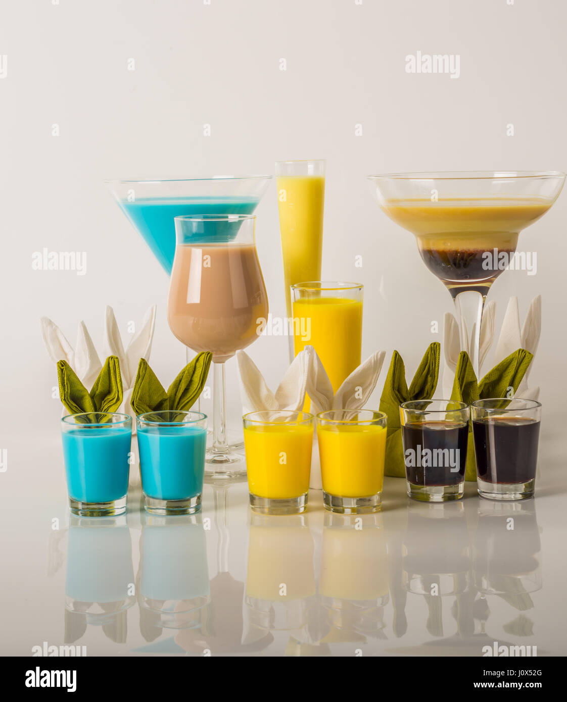 Colorful drinks based on milk liqueurs, unique pastel colors of drinks ...