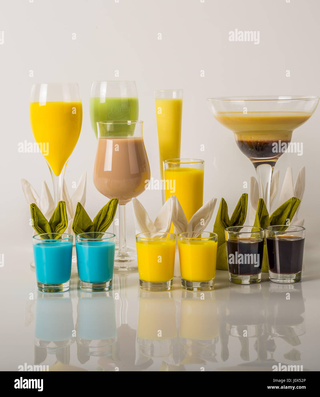 Colorful drinks based on milk liqueurs, unique pastel colors of drinks ...