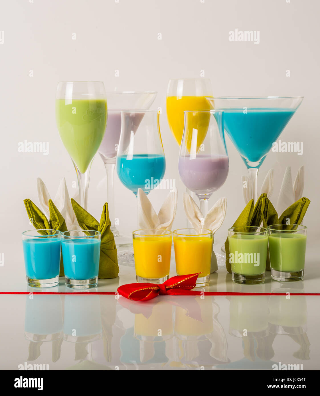 Colorful drinks based on milk liqueurs, unique pastel colors of drinks ...
