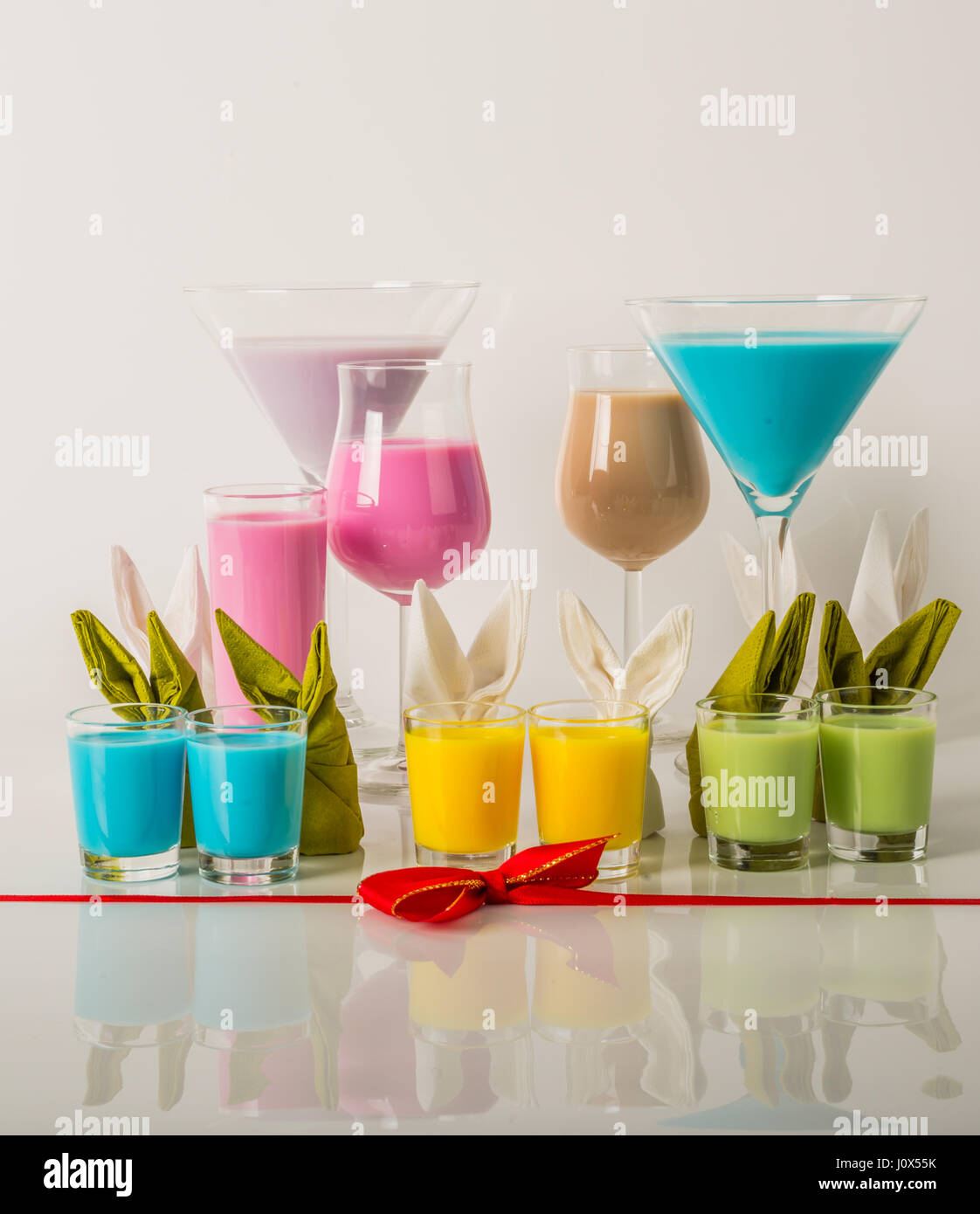 Colorful drinks based on milk liqueurs, unique pastel colors of drinks ...