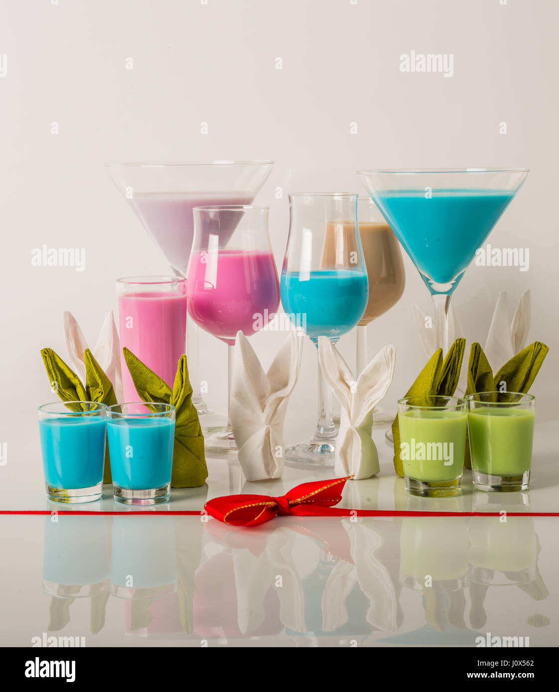 Colorful drinks based on milk liqueurs, unique pastel colors of drinks ...