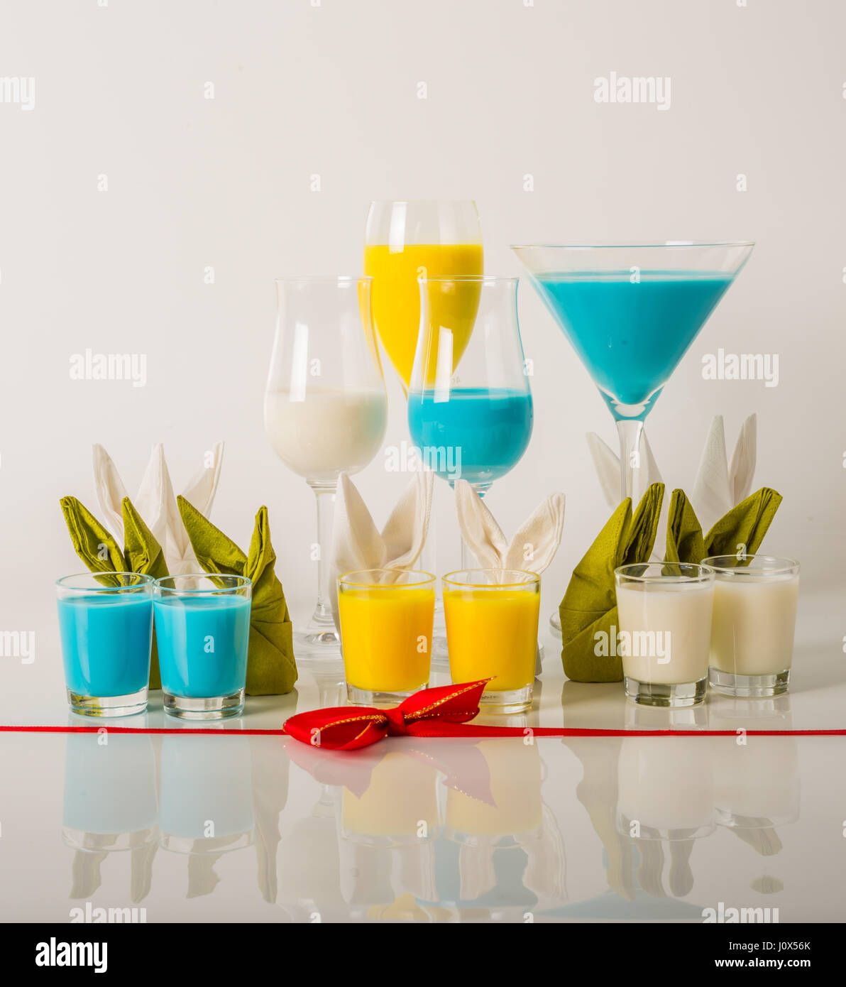 Colorful drinks based on milk liqueurs, unique pastel colors of drinks ...