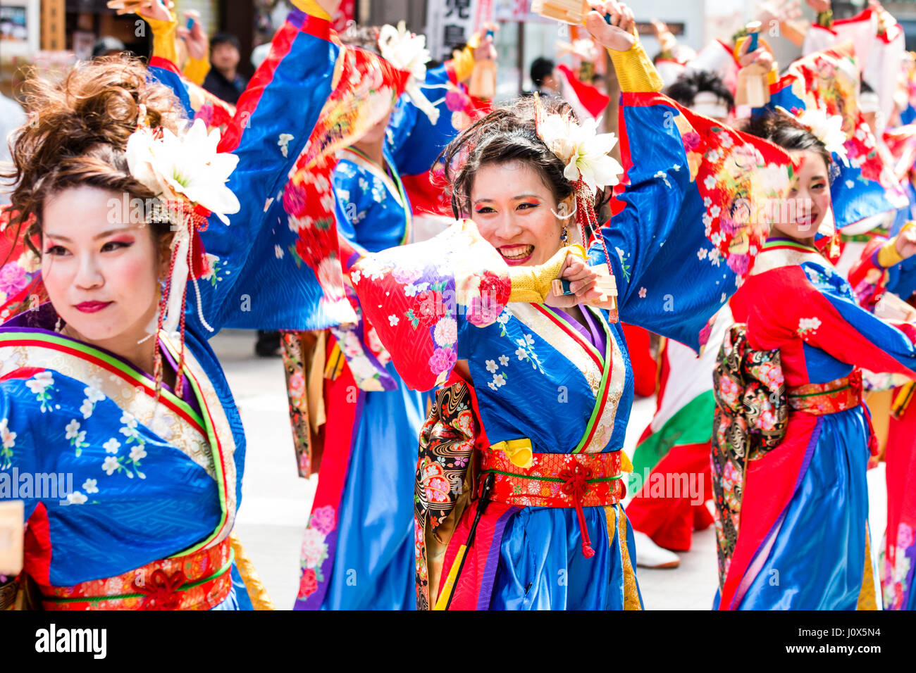 Hinokuni Yosakoi Dance Festival. Women team in blue and red yukata ...