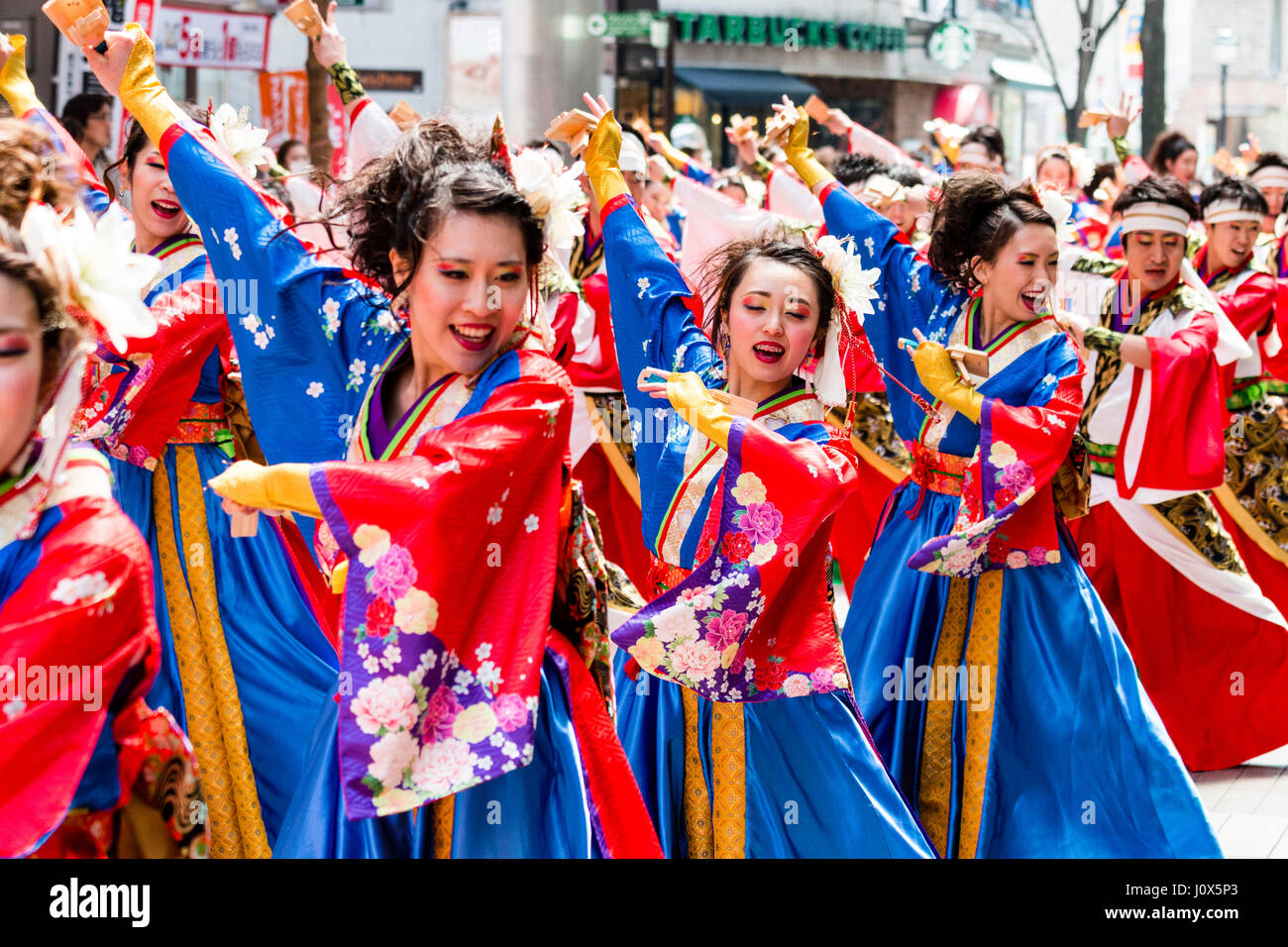 Hinokuni Yosakoi Dance Festival. Women team in blue and red yukata ...