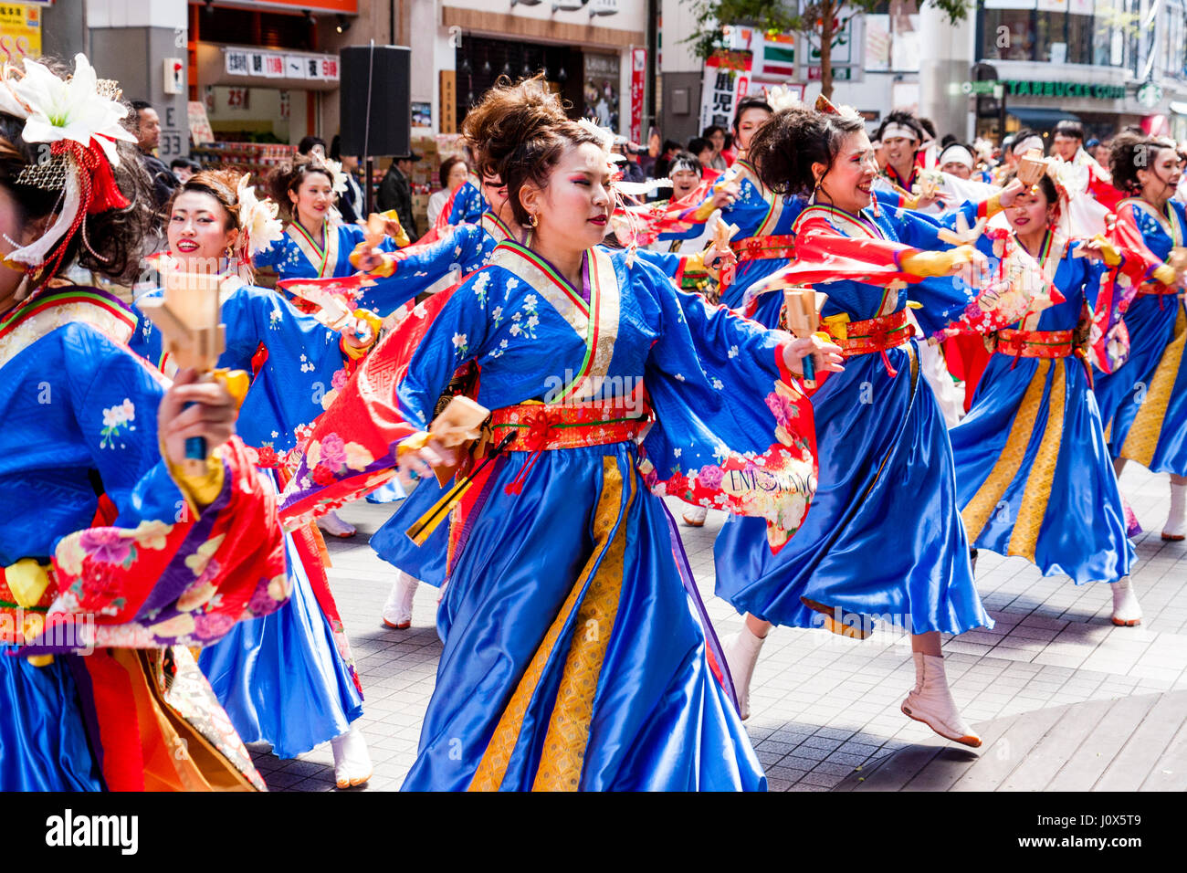 Hinokuni Yosakoi Dance Festival. Women team in blue and red yukata ...