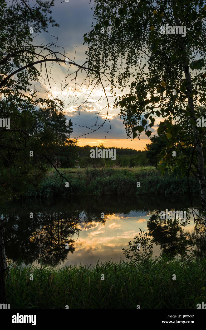 Wonderful evening on the northern lake Stock Photo - Alamy