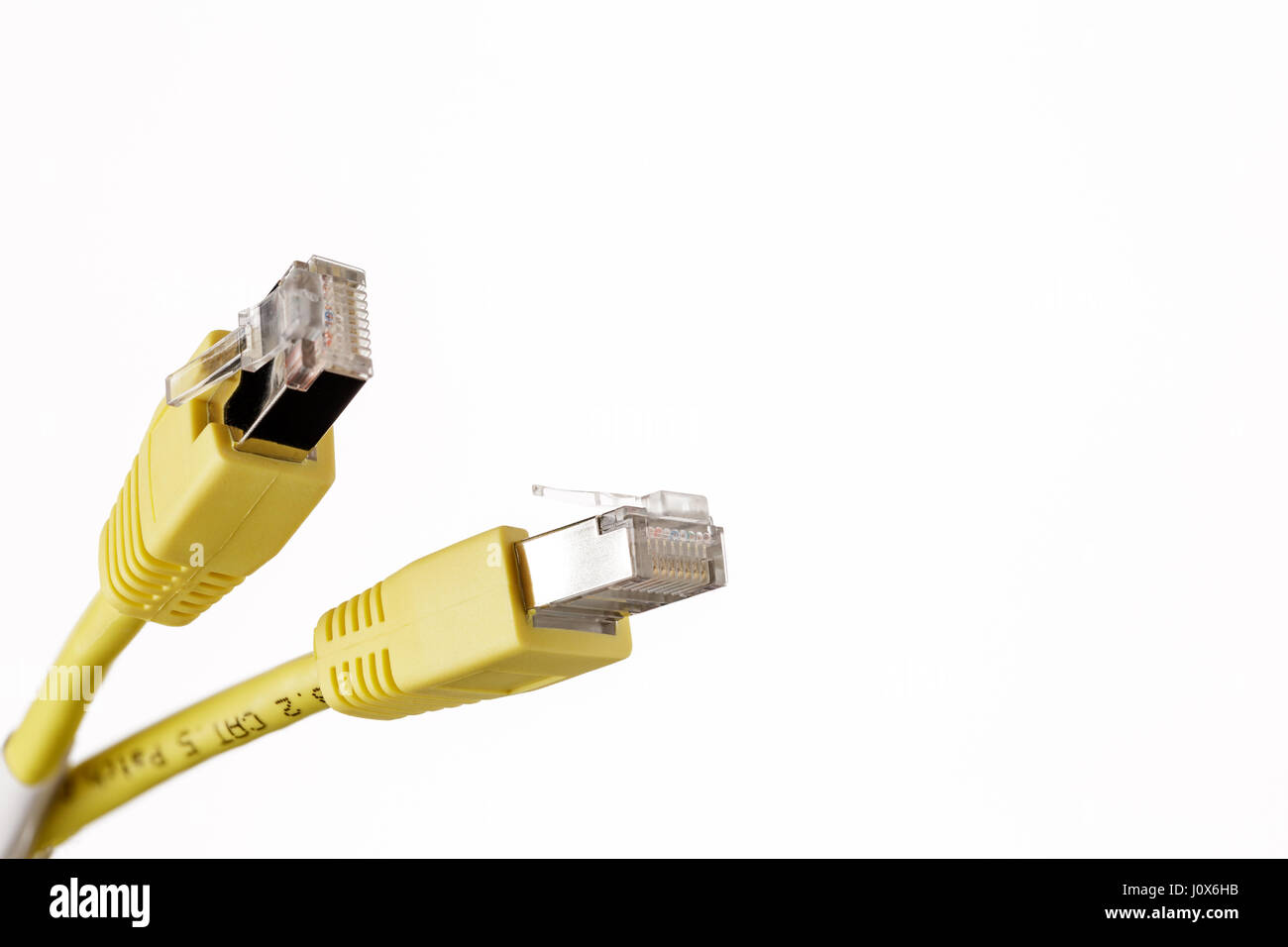 Two telecommunication cable with connector RJ45 Stock Photo - Alamy