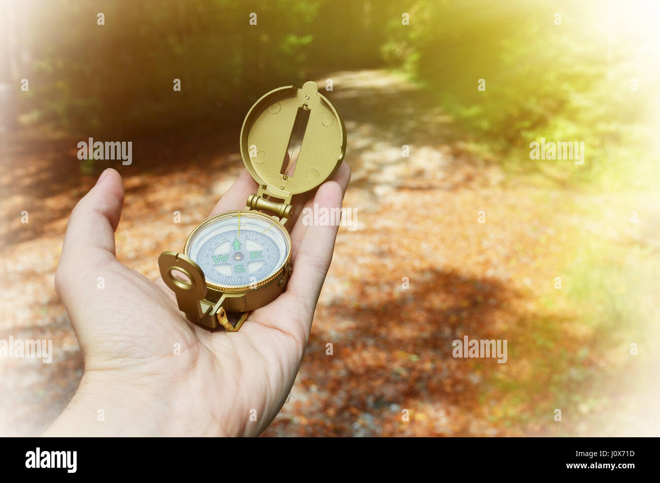 Compass in the hand Stock Photo - Alamy
