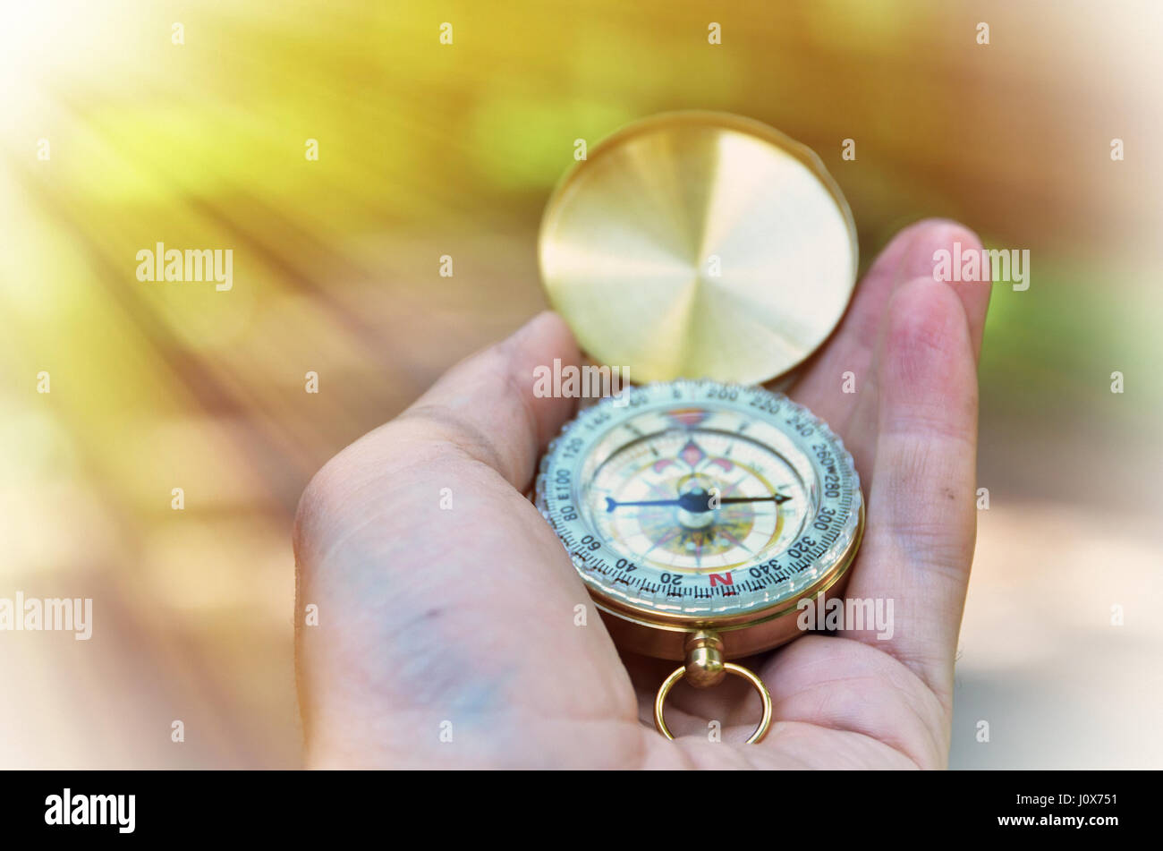 Compass in the hand Stock Photo - Alamy