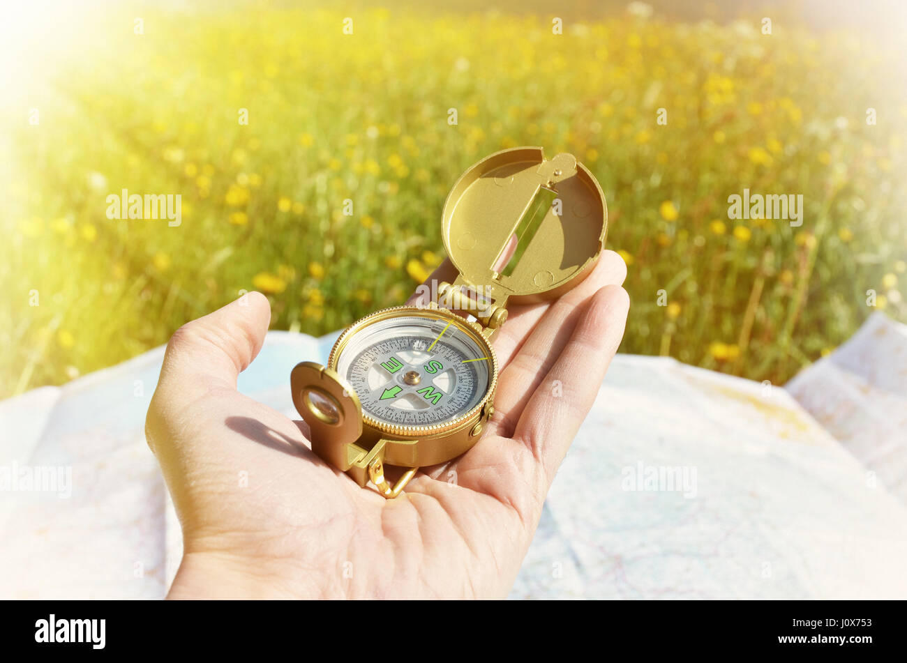 Compass in the hand Stock Photo - Alamy