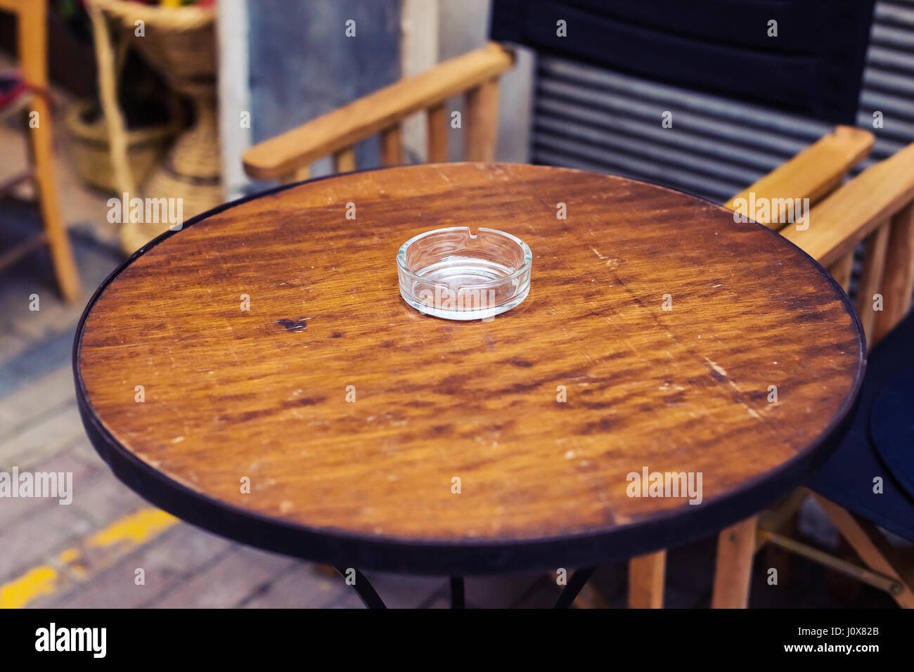 glass ashtray on the table Stock Photo - Alamy