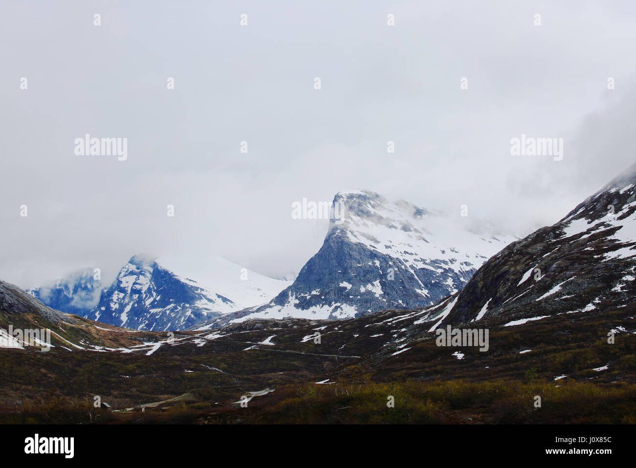 Beautiful spring Norway mountains with melting snow on tops Stock Photo ...