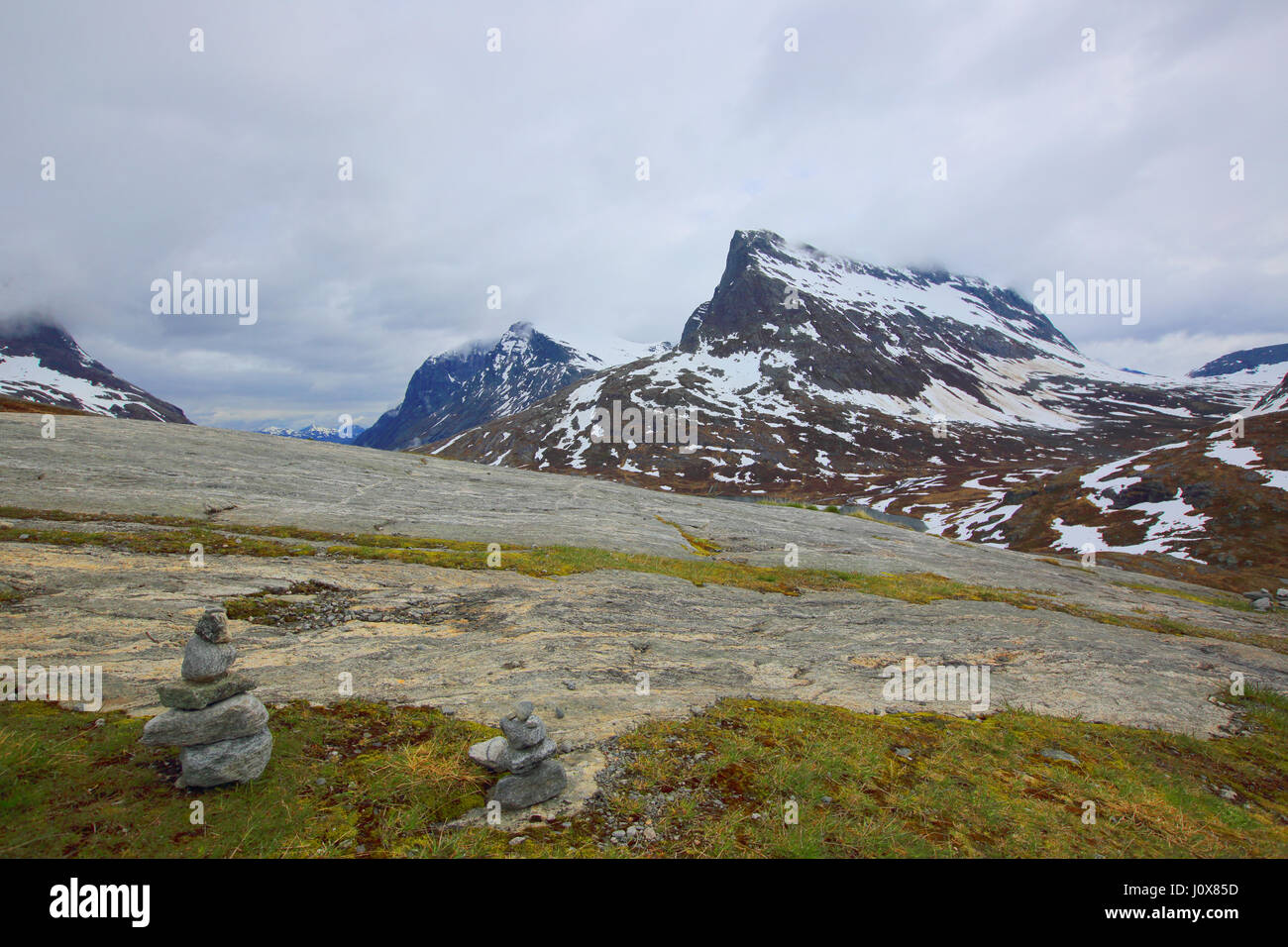 Stacks of stones in beautiful spring norway mountains Stock Photo - Alamy