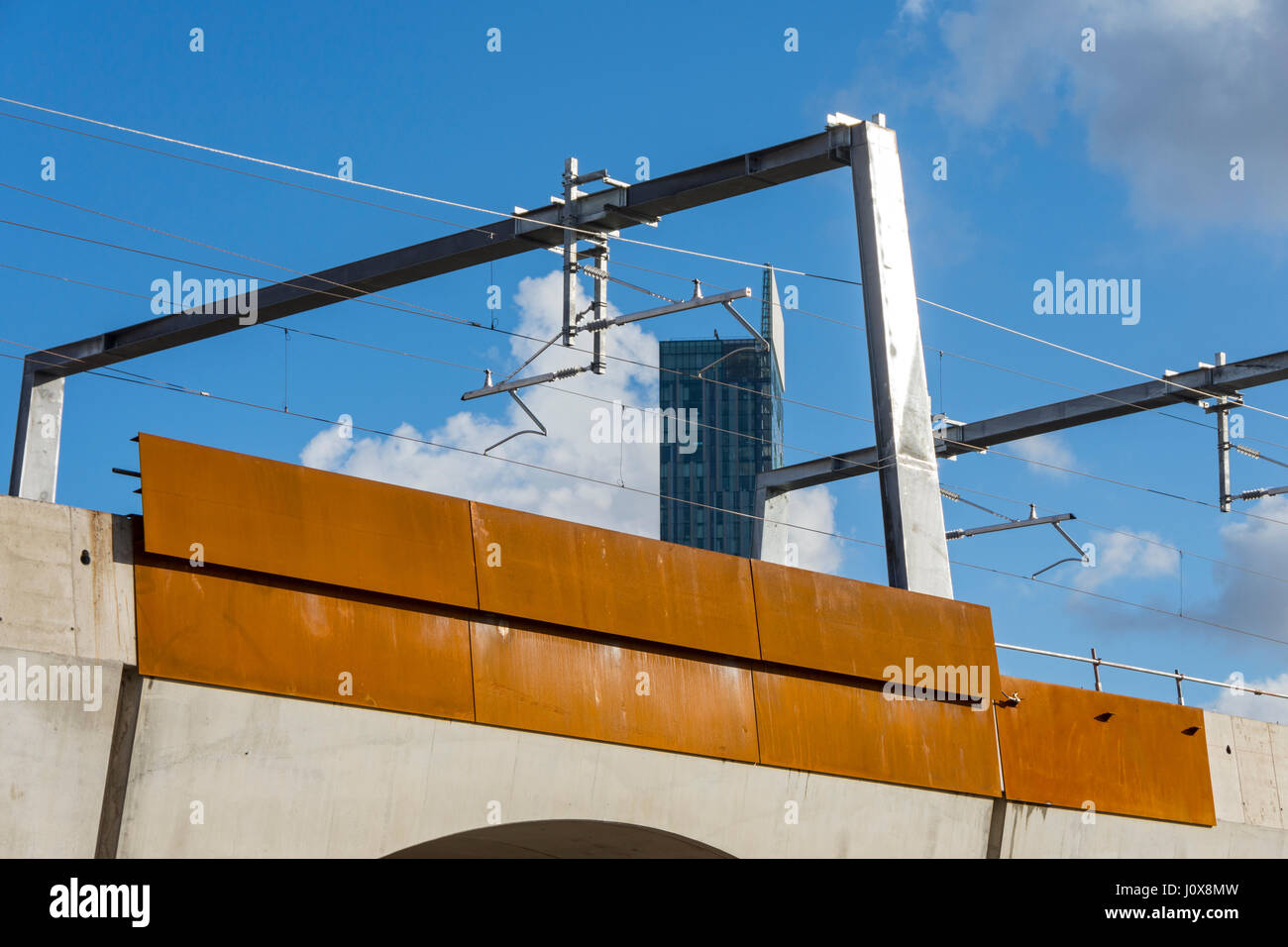 Weathering steel side panels on the newly widened section of a railway ...