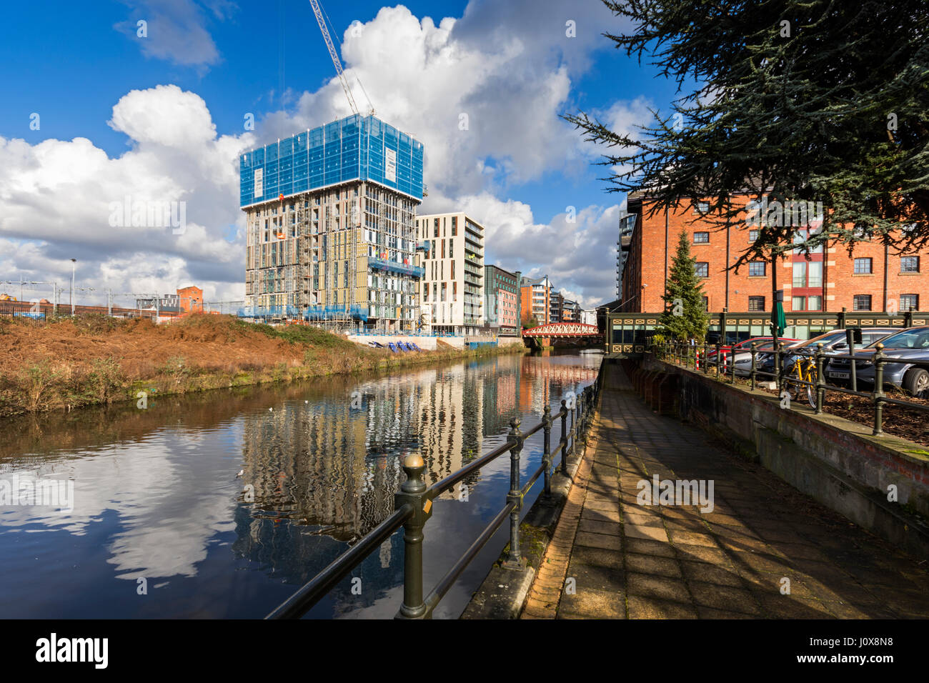 The 'Slate Yard' apartment block under construction, over the river ...
