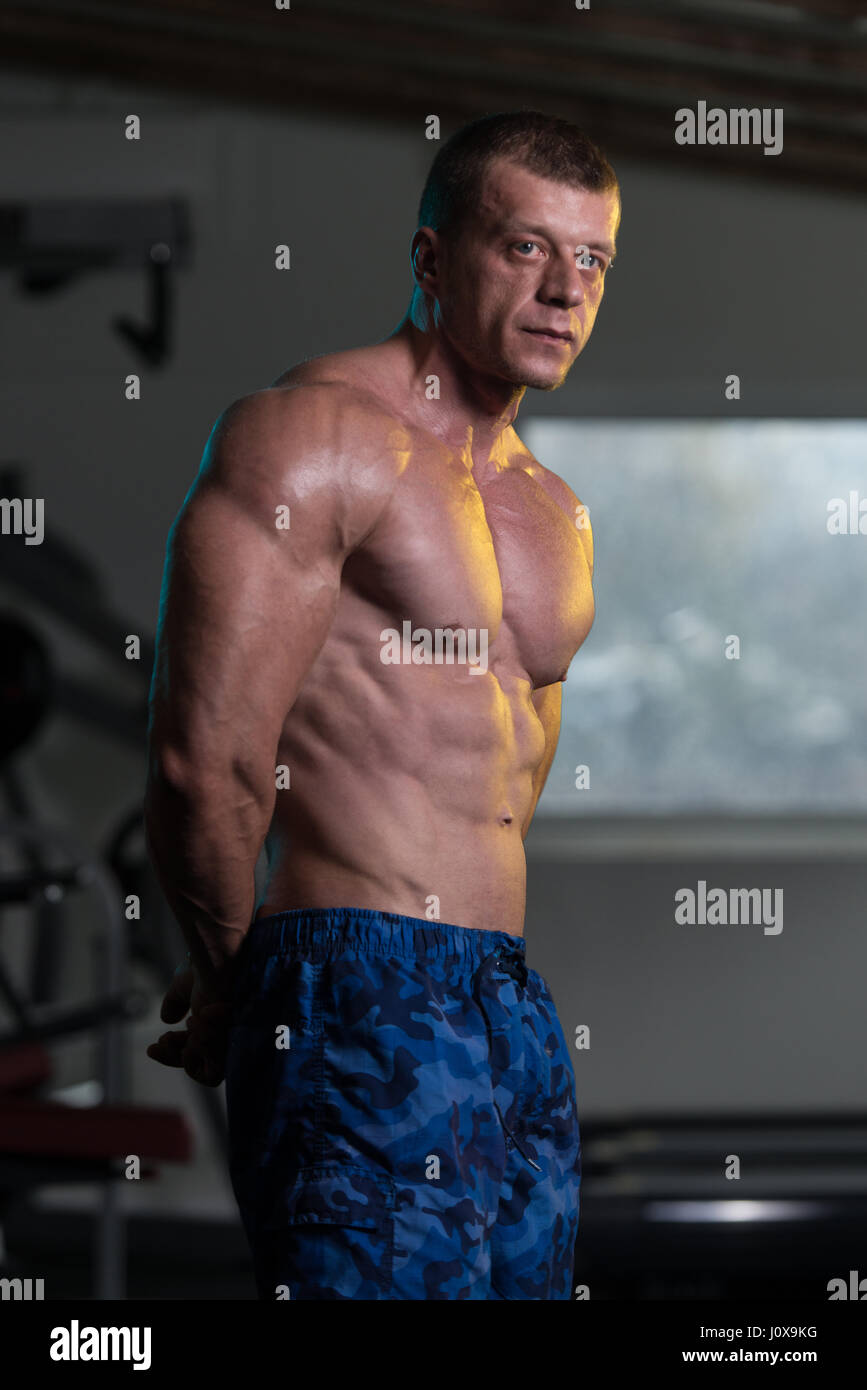 Portrait Of A Physically Fit Man Showing His Well Trained Body ...