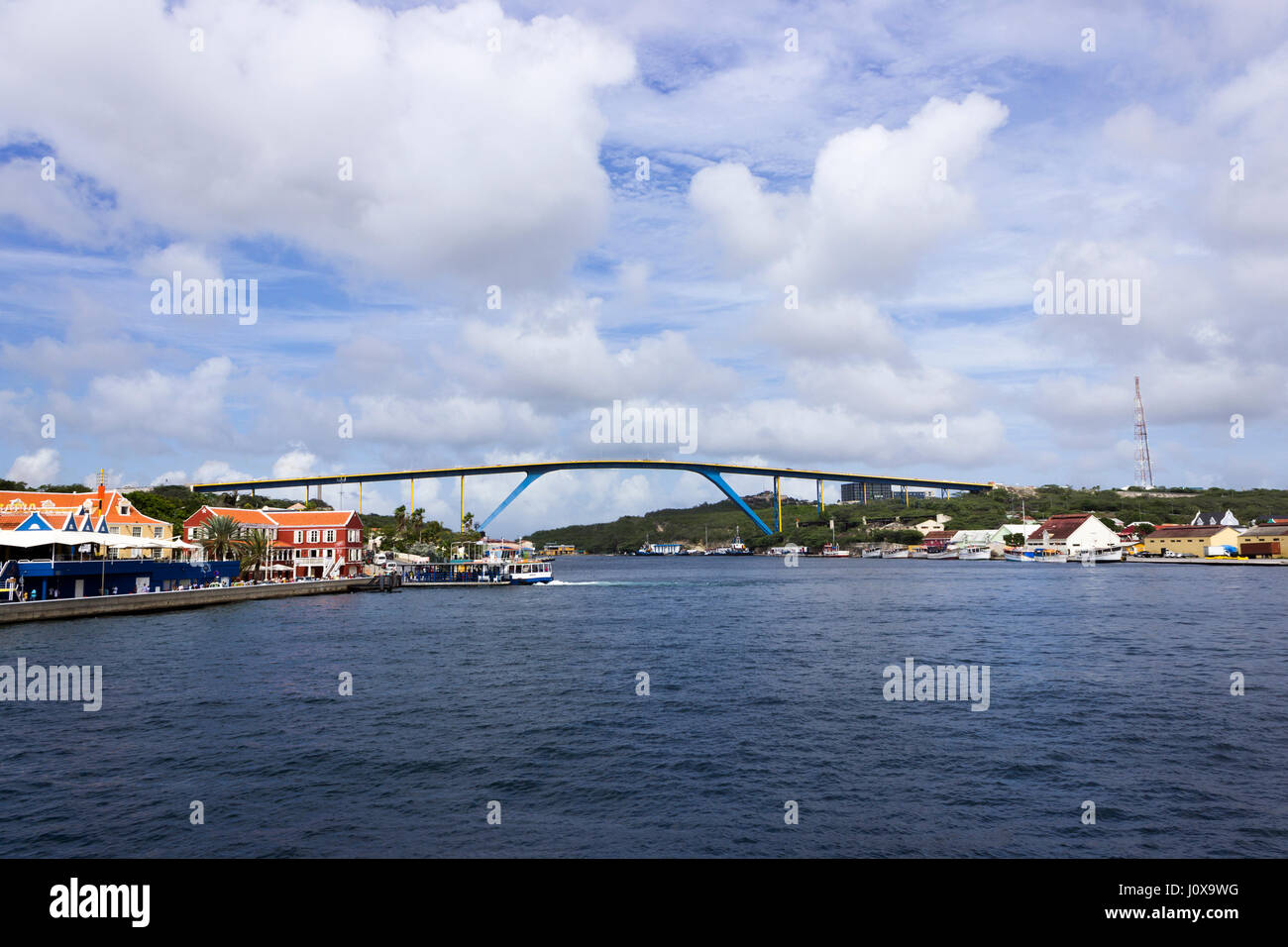 The Queen Juliana Bridge towers over St. Anna Bay in Willemstad ...