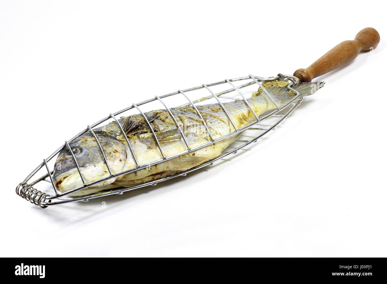 gilthead seabream in fish basket isolated on white background Stock ...
