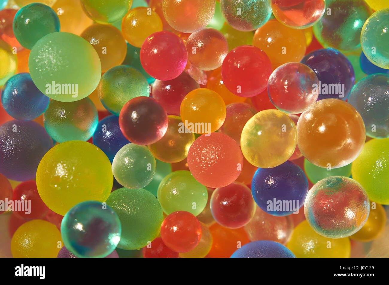 Background made with scattered color gel balls Stock Photo - Alamy
