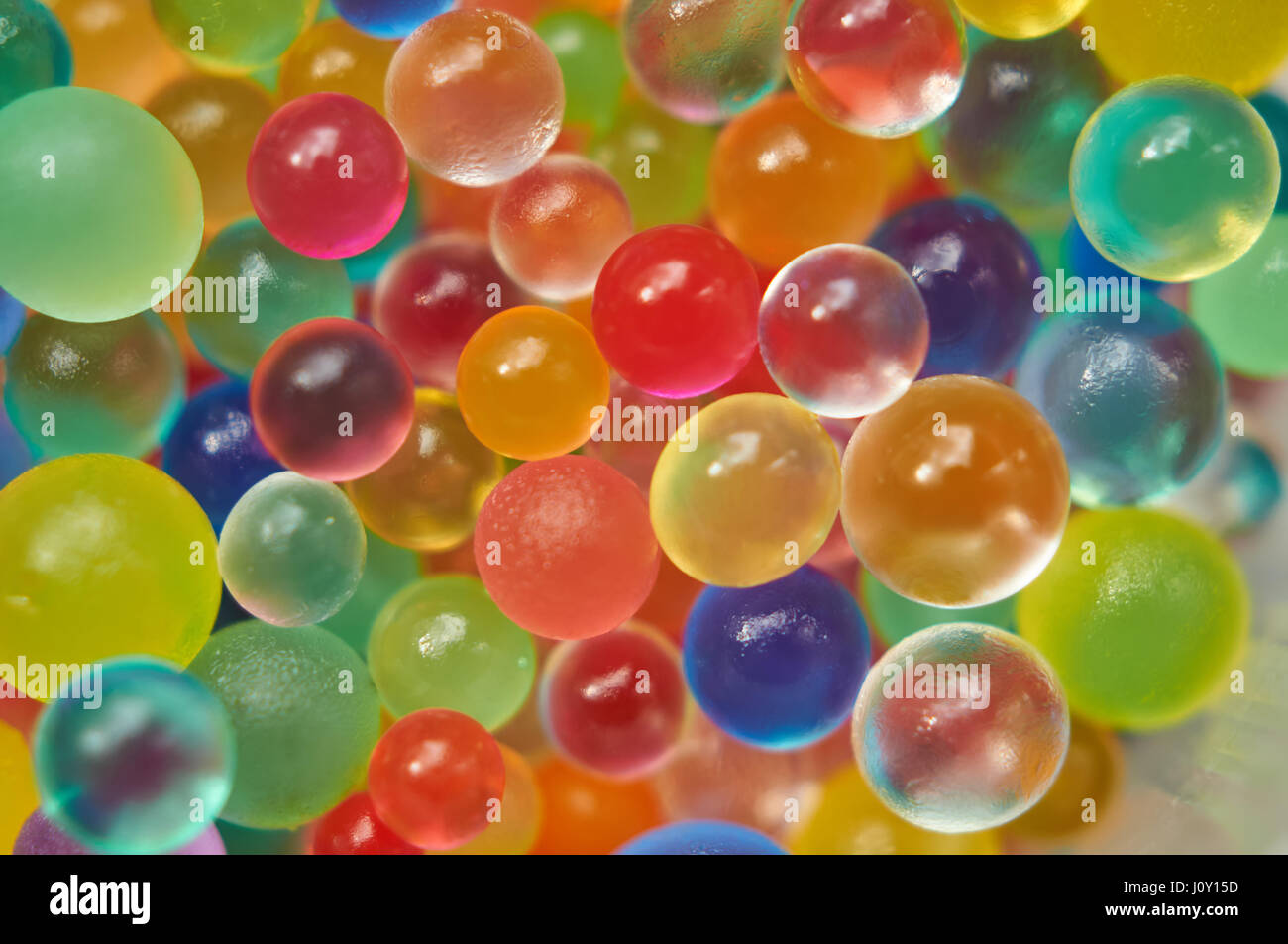 Background made with scattered color gel balls Stock Photo - Alamy