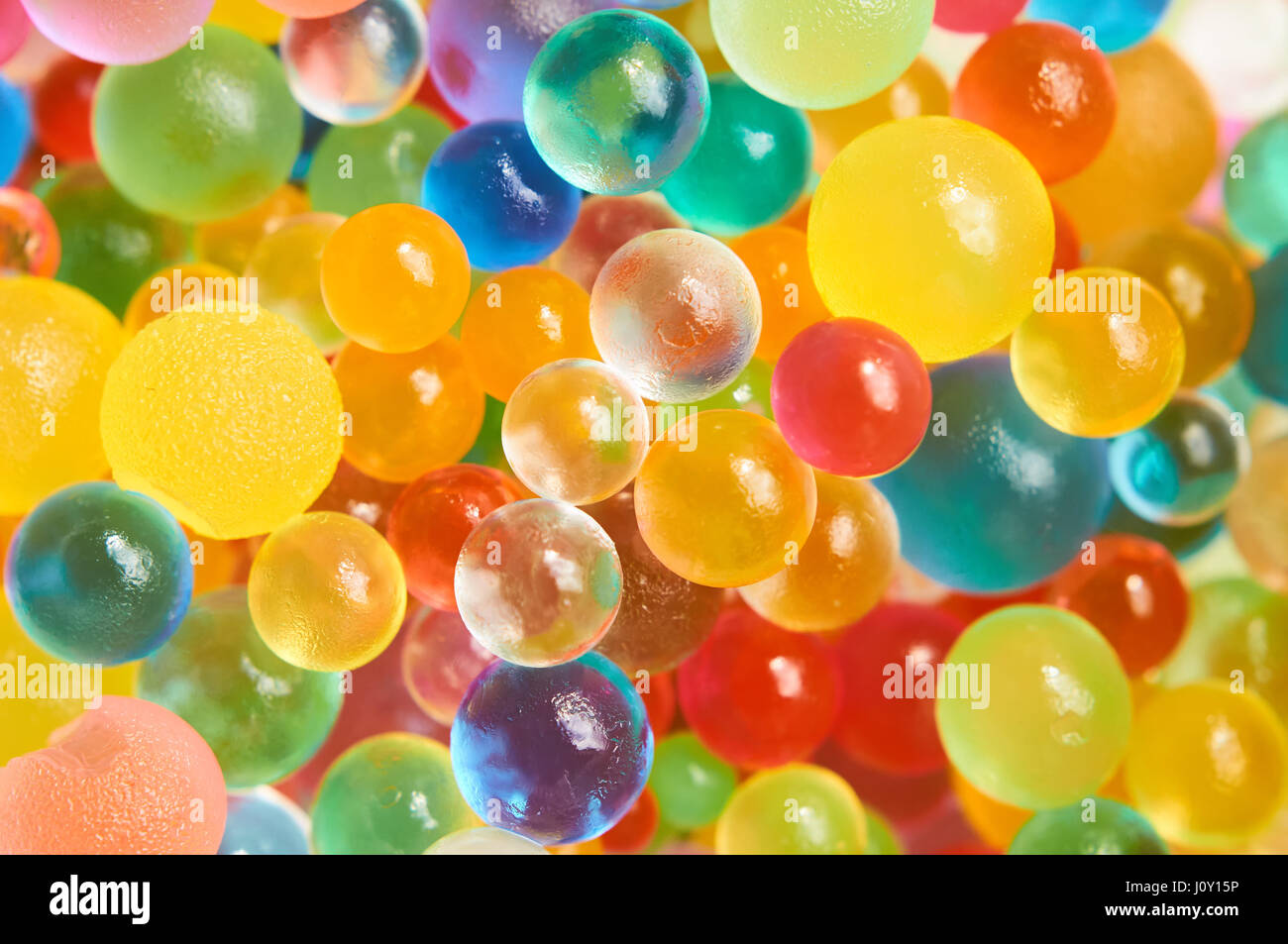 Background made with scattered color gel balls Stock Photo - Alamy