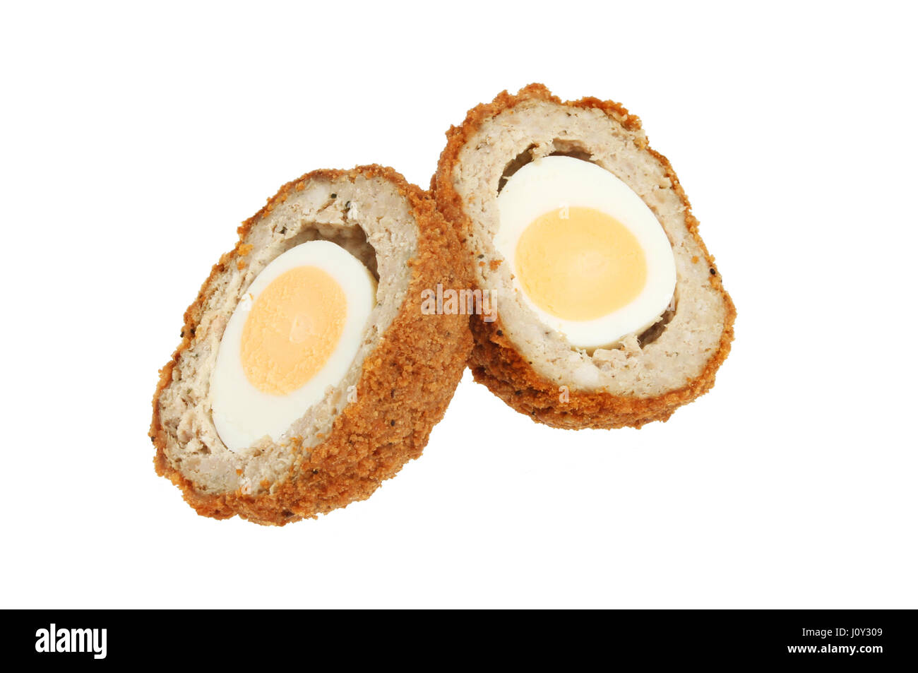 Scotch egg cut in half isolated against white Stock Photo - Alamy
