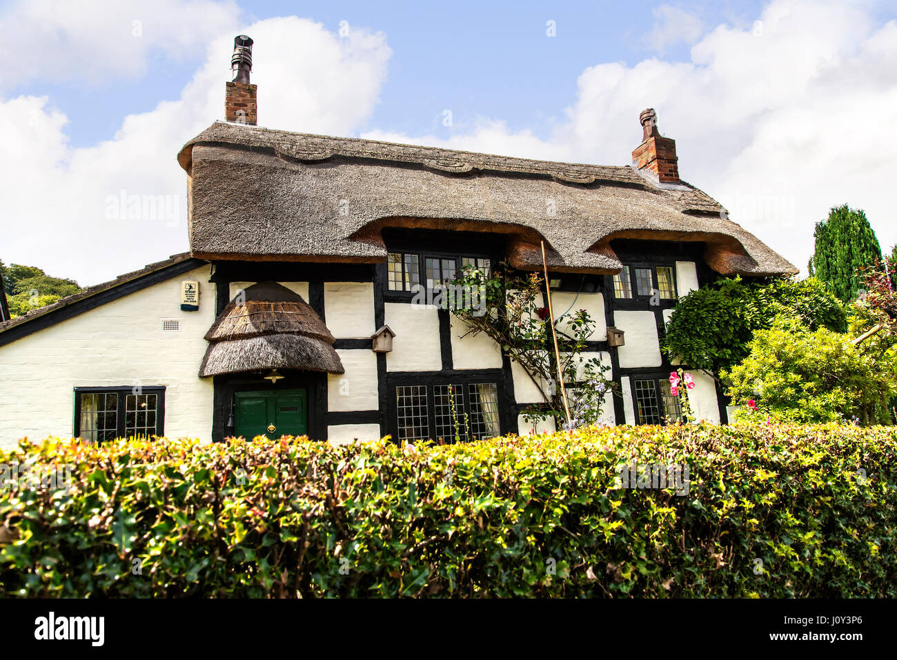 The Hough Holly Trees is a timber framed thatched cottage in Alderley ...