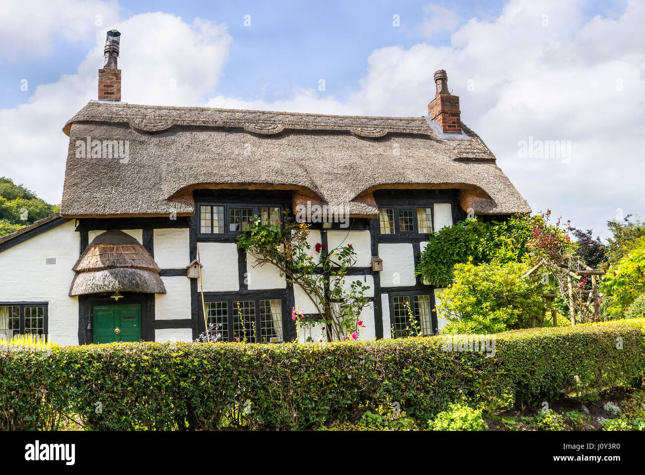 The Hough Holly Trees is a timber framed thatched cottage in Alderley ...