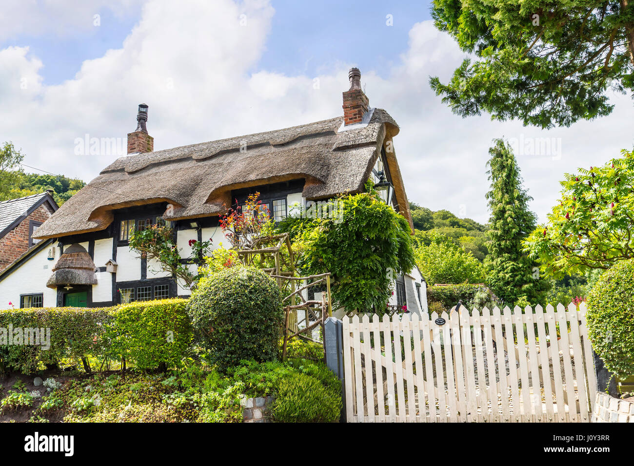 The Hough Holly Trees is a timber framed thatched cottage in Alderley ...