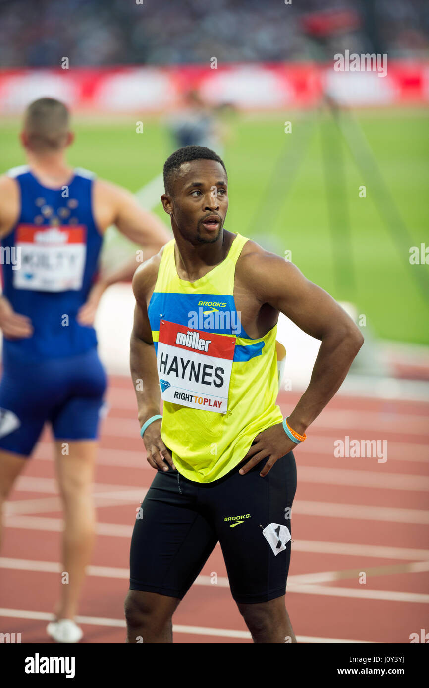 Competing in the mens 100m heat 2 at the london hi-res stock ...
