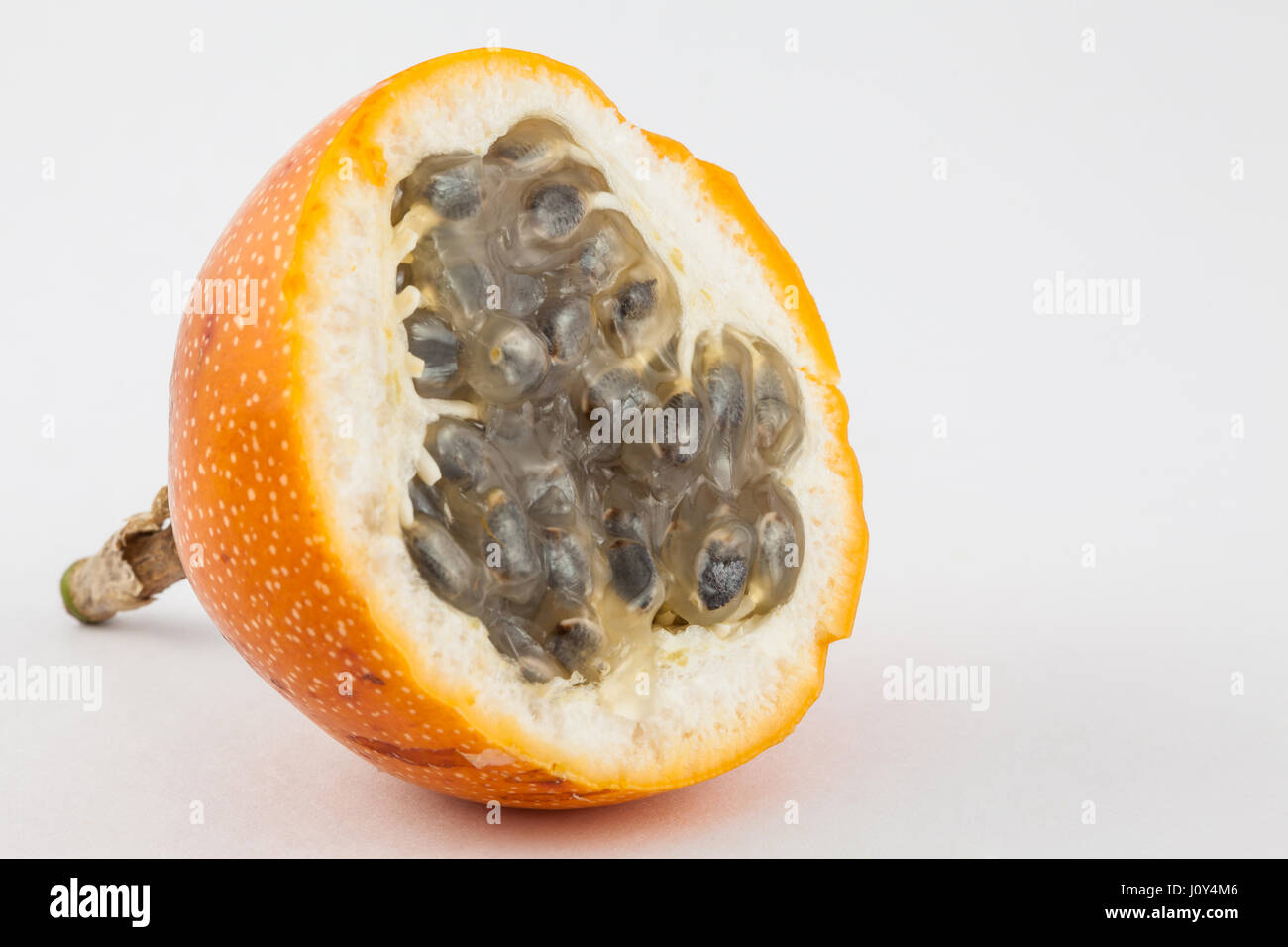Sweet granadilla (Passiflora ligularis) isolated in white background ...