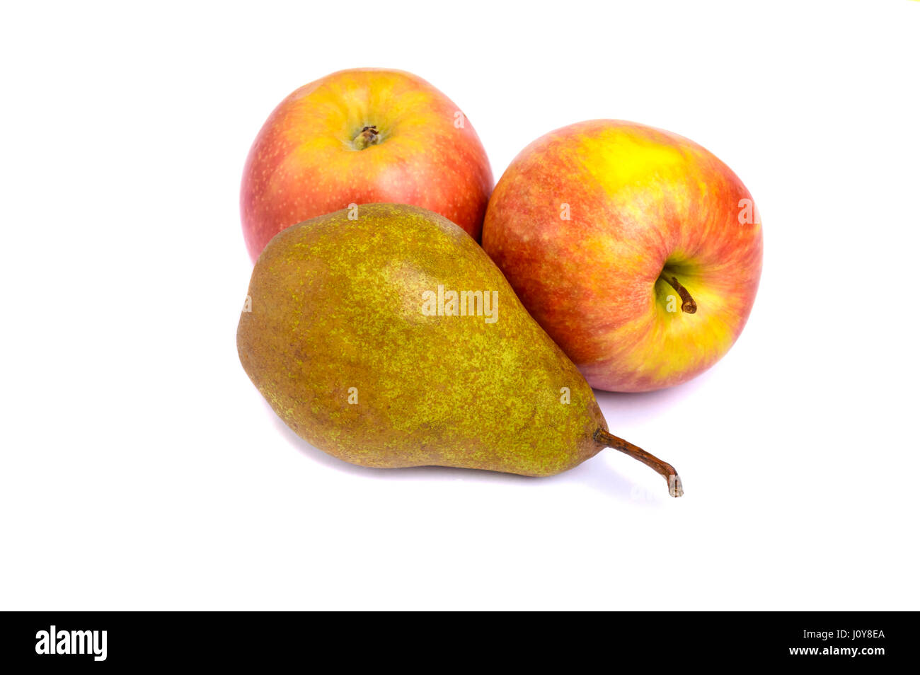 A large yellow (brown) pear and two ripe ruddy red-yellow apple ...