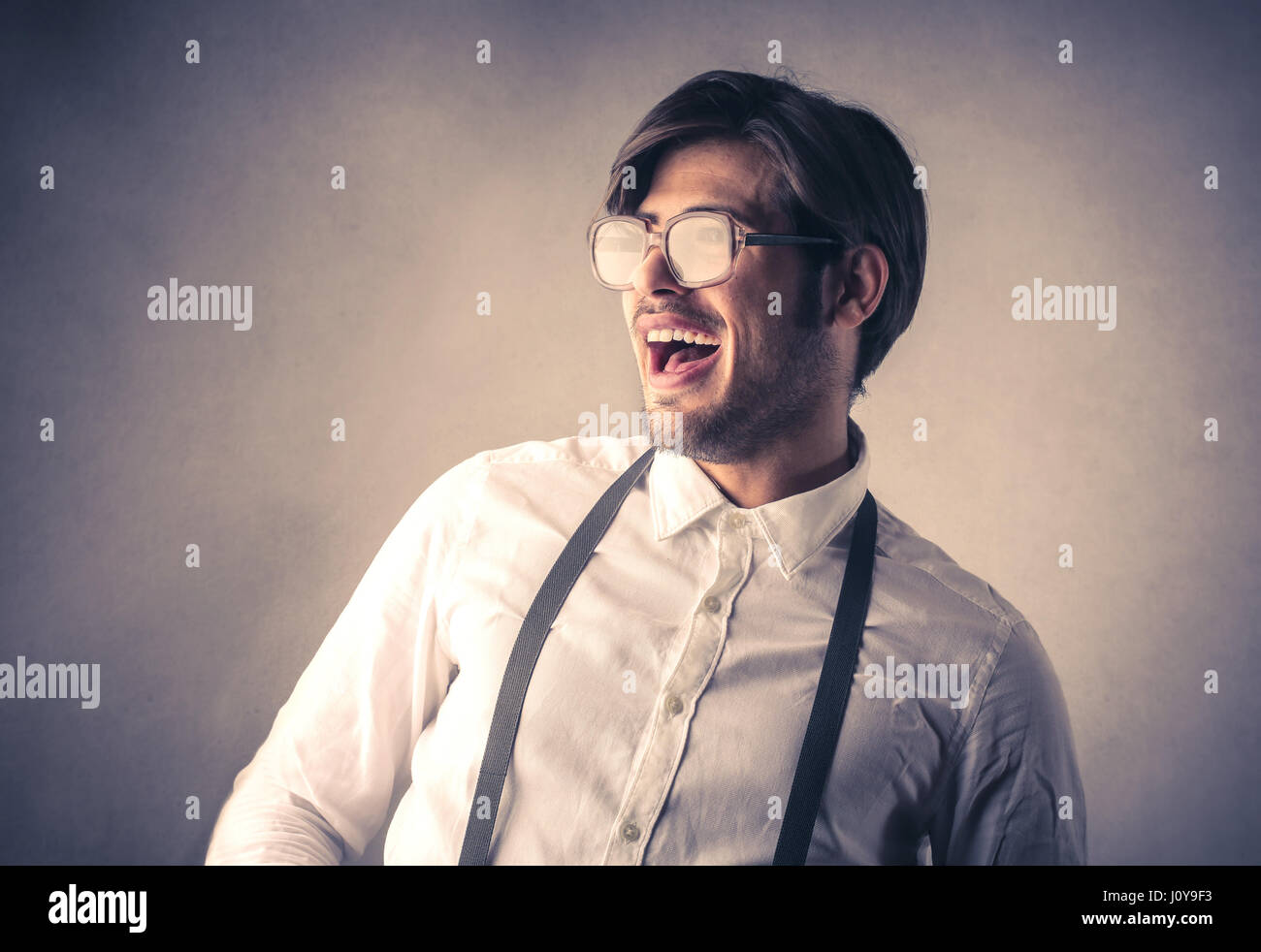 Portrait of laughing businessman Stock Photo - Alamy