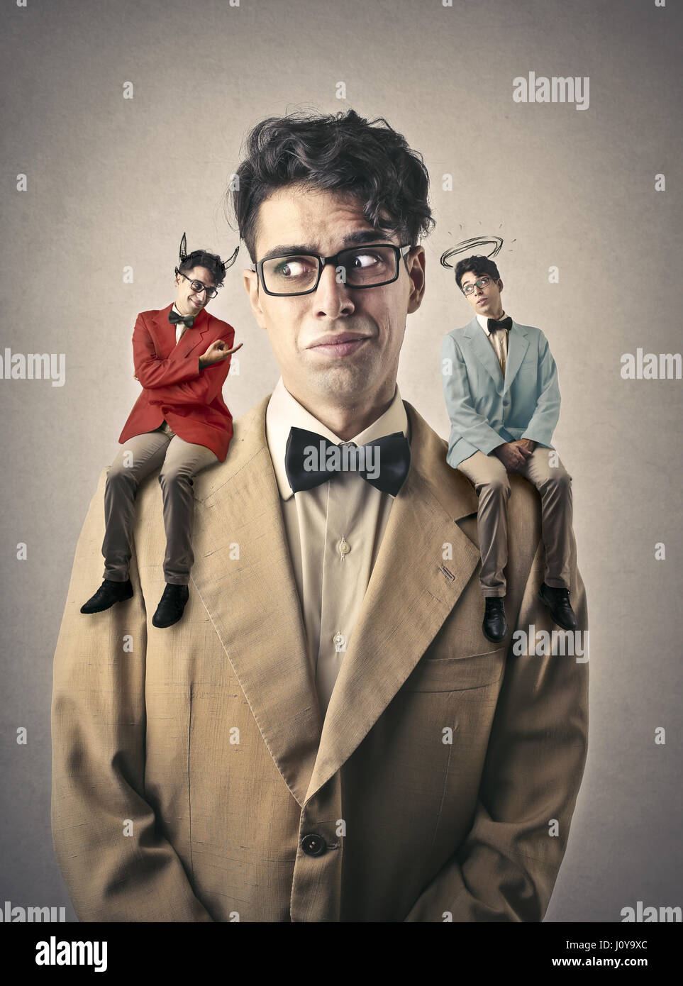 Man with devil and angel on his shoulders Stock Photo - Alamy