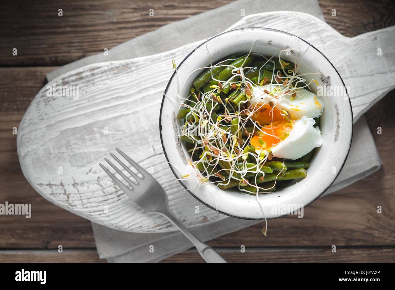 Salad with beans on a wooden stand horizontal Stock Photo - Alamy