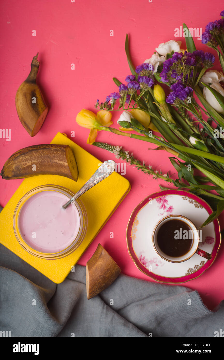 Spring breakfast on the pink background vertical Stock Photo - Alamy