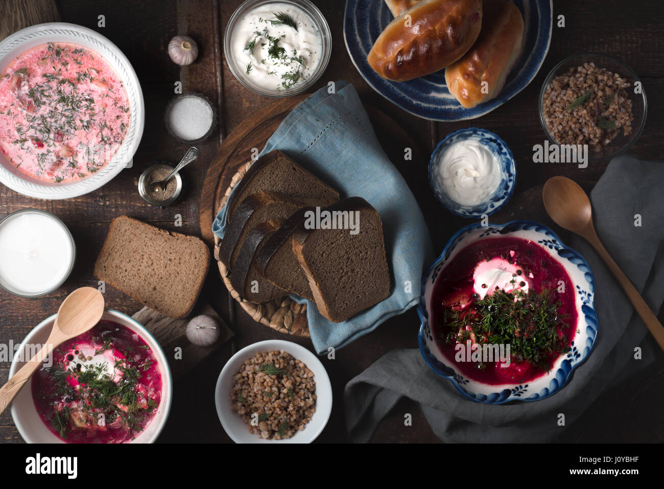 Dinner with traditional Russian dishes on the wooden table top view ...