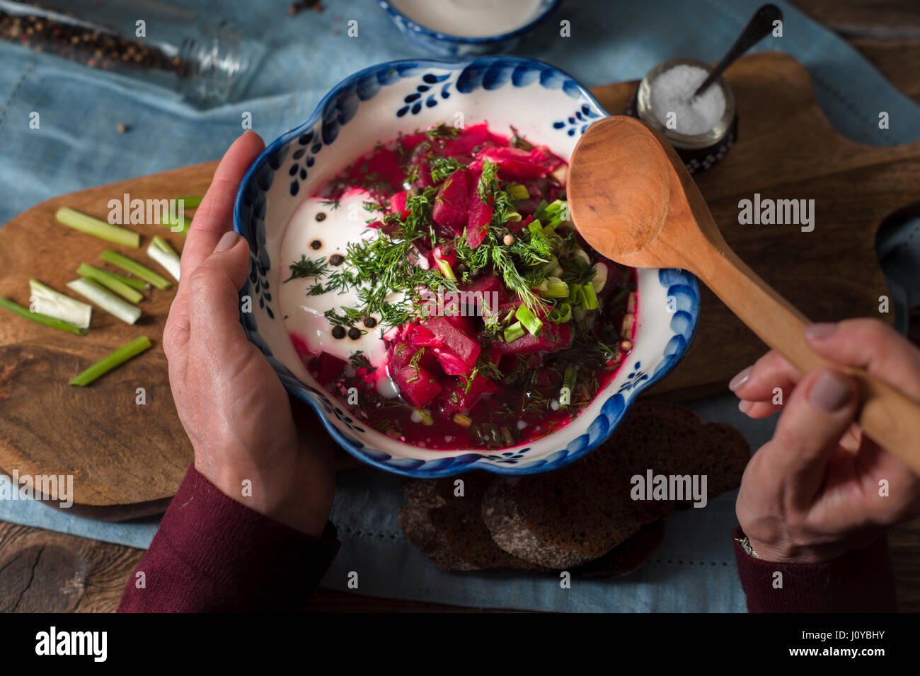 Eating borscht from ceramic plate horizontal Stock Photo - Alamy