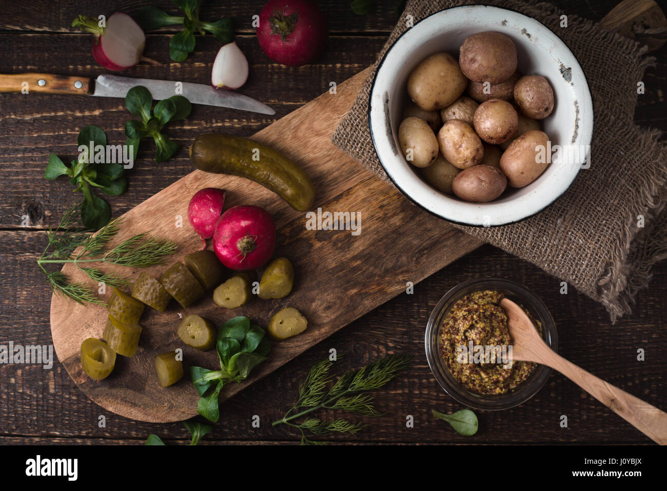 Ingredients for rustic vegetable salad on the wooden table top view ...