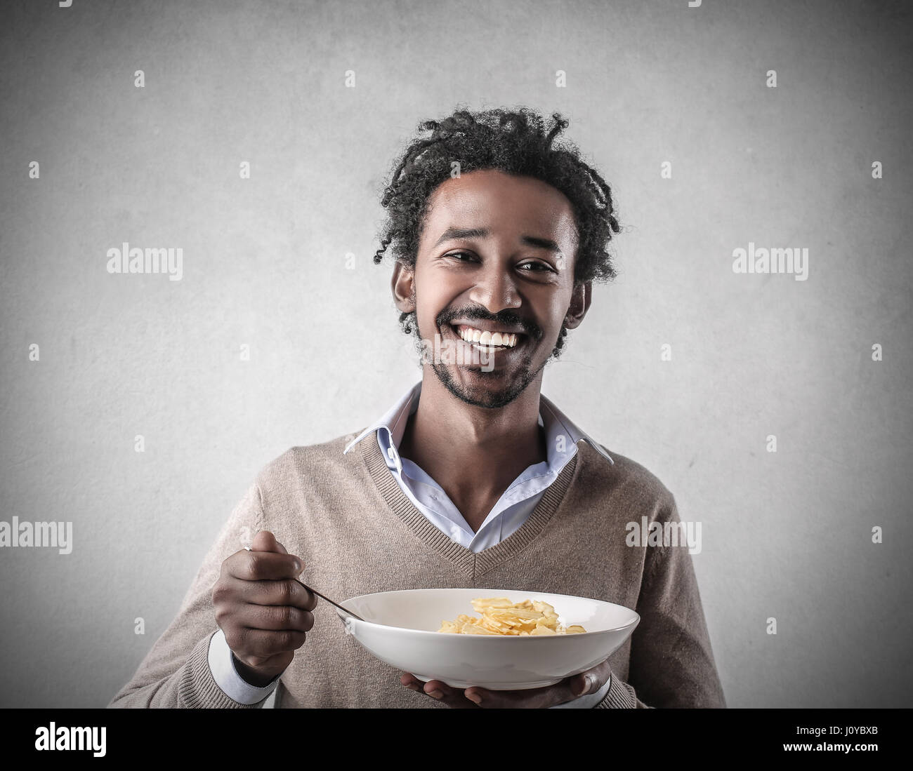 Hungry black man portrait hi-res stock photography and images - Alamy