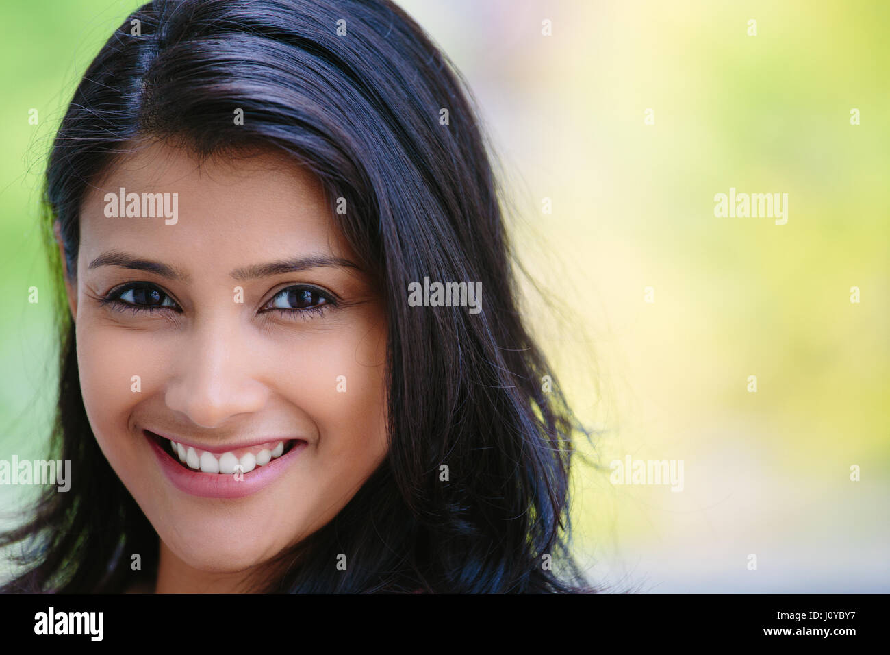 Closeup headshot portrait of confident smiling happy pretty young woman ... Closeup headshot portrait of confident smiling happy pretty young woman ...