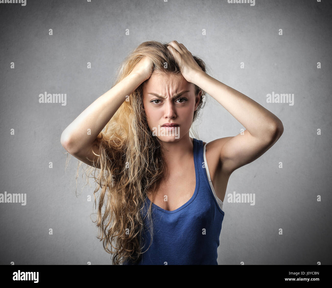Portrait of uptight woman Stock Photo - Alamy