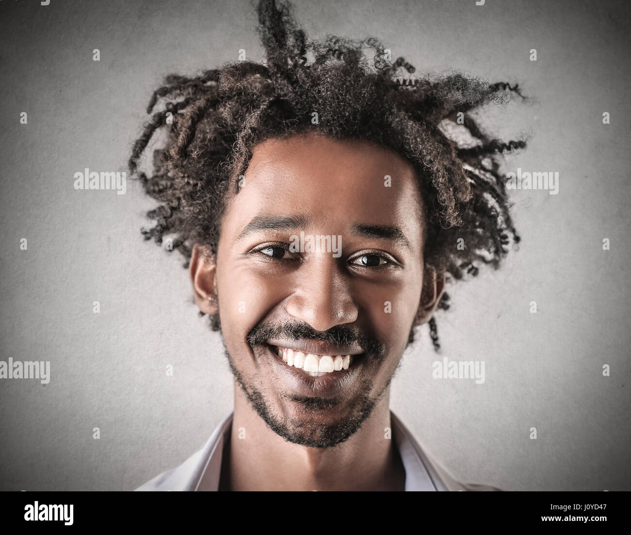 Young black man smiling Stock Photo - Alamy Young black man smiling Stock Photo - Alamy