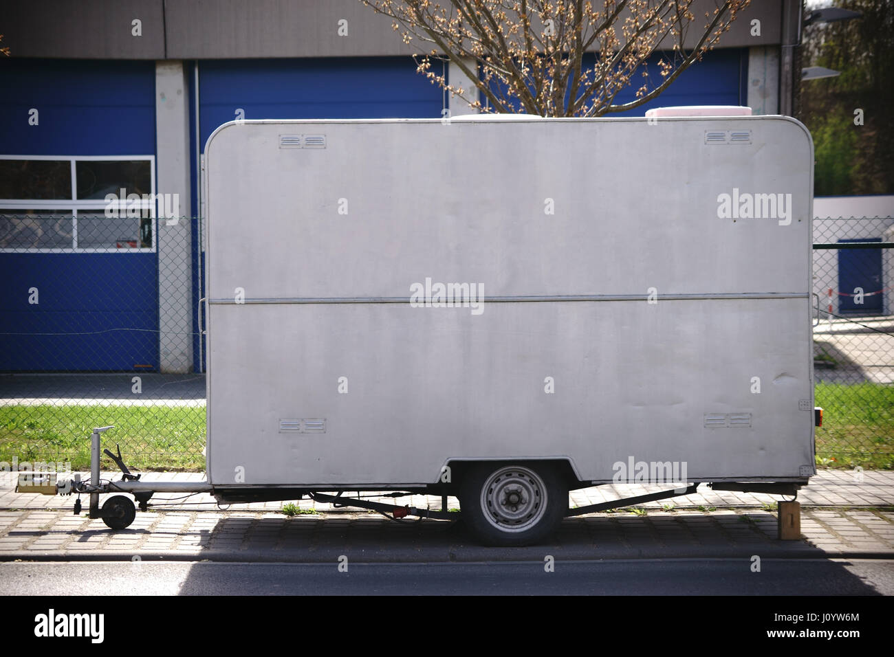 A car trailer with canopy and transport of small objects, tools and ...