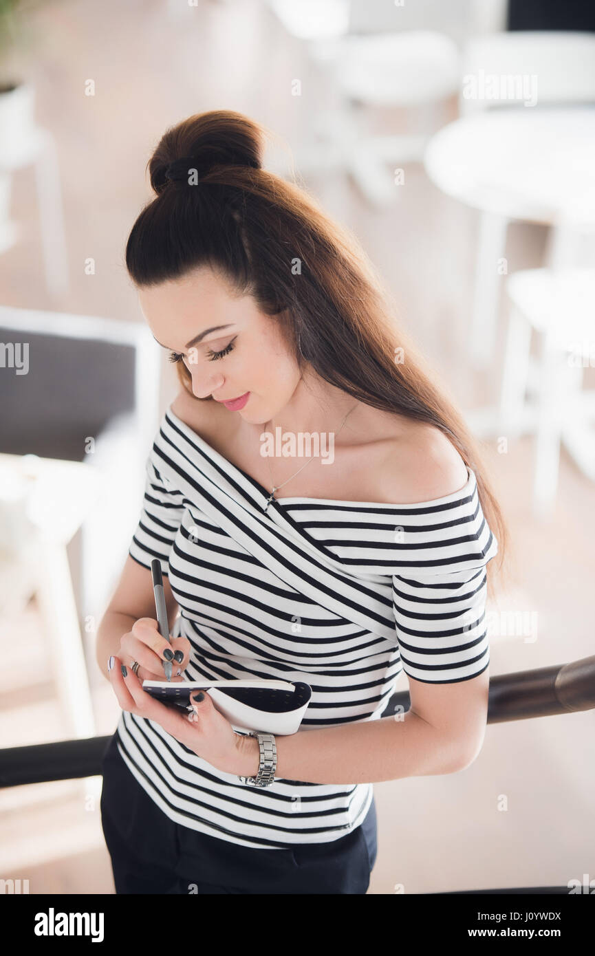 Beautiful office girl taking notes hi-res stock photography and images ...